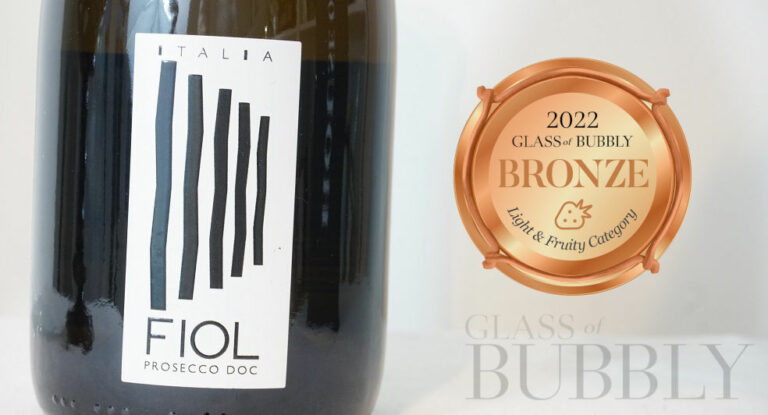 Under The Light Of Darkness Cocktail – Glass Of Bubbly