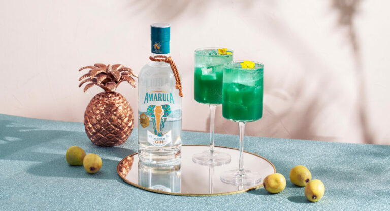 Blue Lagoon Cocktail – Crafted With Amarula – Glass Of Bubbly